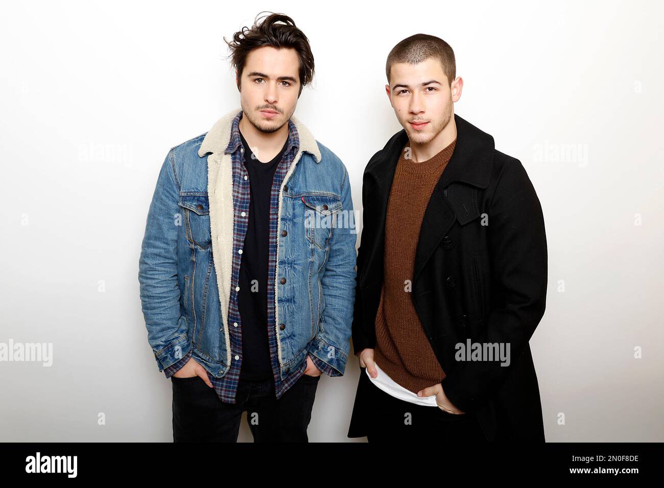 Actors Ben Schnetzer, left, and Nick Jonas pose for a portrait to ...