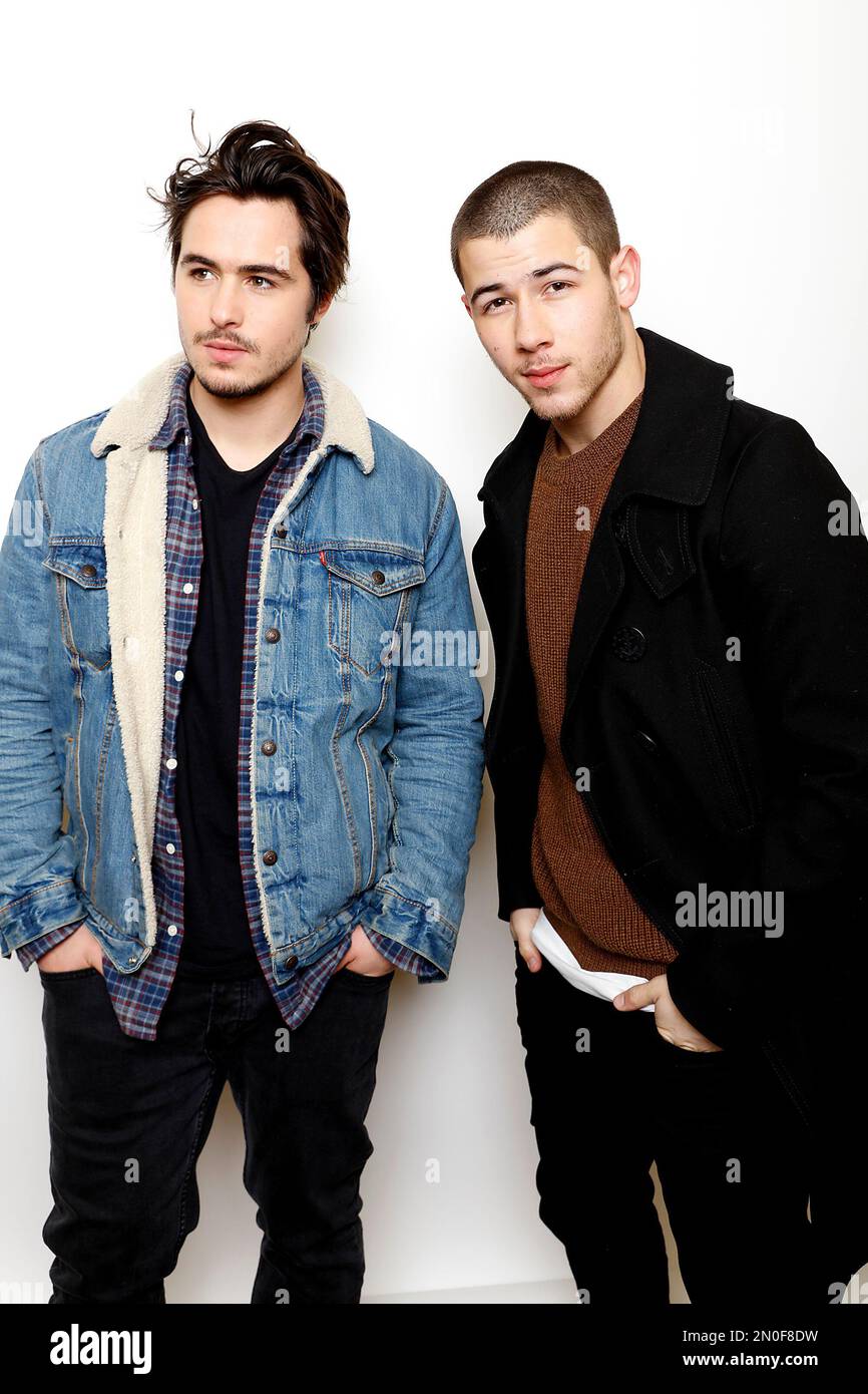 Actors Ben Schnetzer, left, and Nick Jonas pose for a portrait to ...