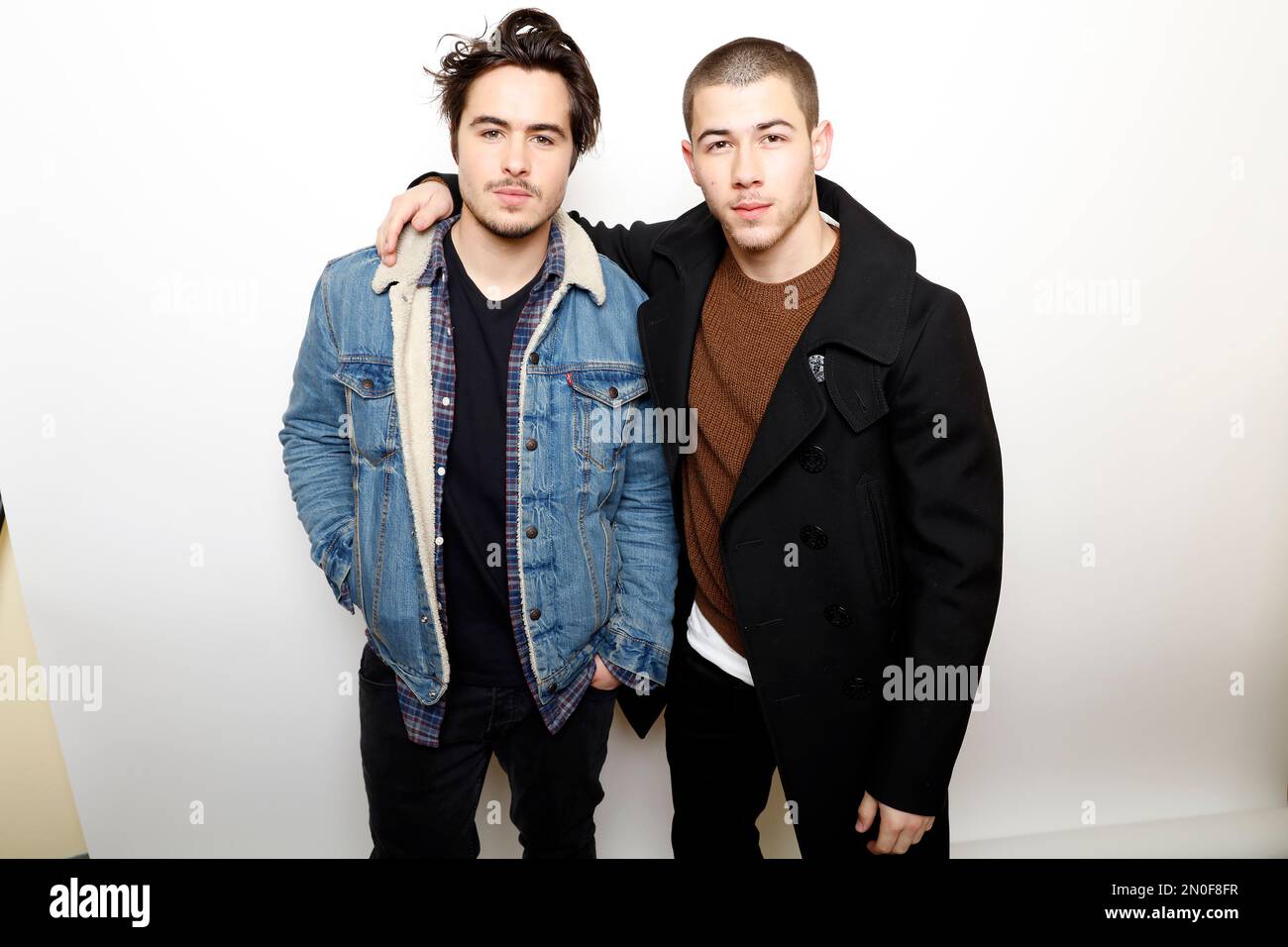 Actors Ben Schnetzer, left, and Nick Jonas pose for a portrait to ...