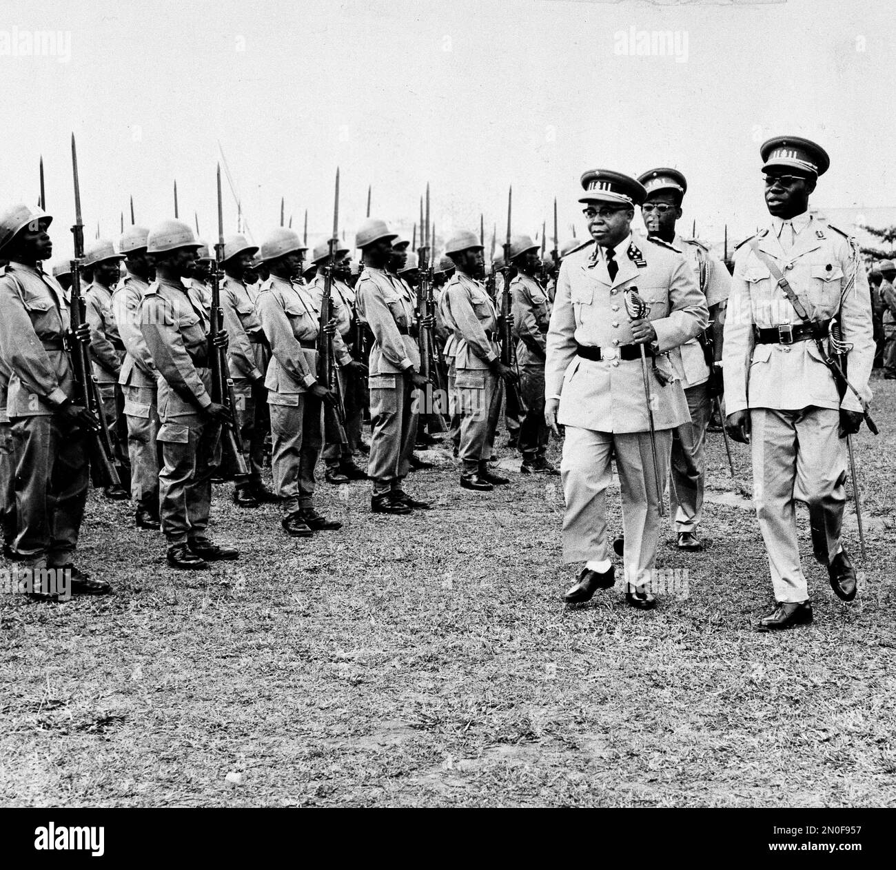 President Joseph Kasavubu of the Congo, second from right, inspects ...