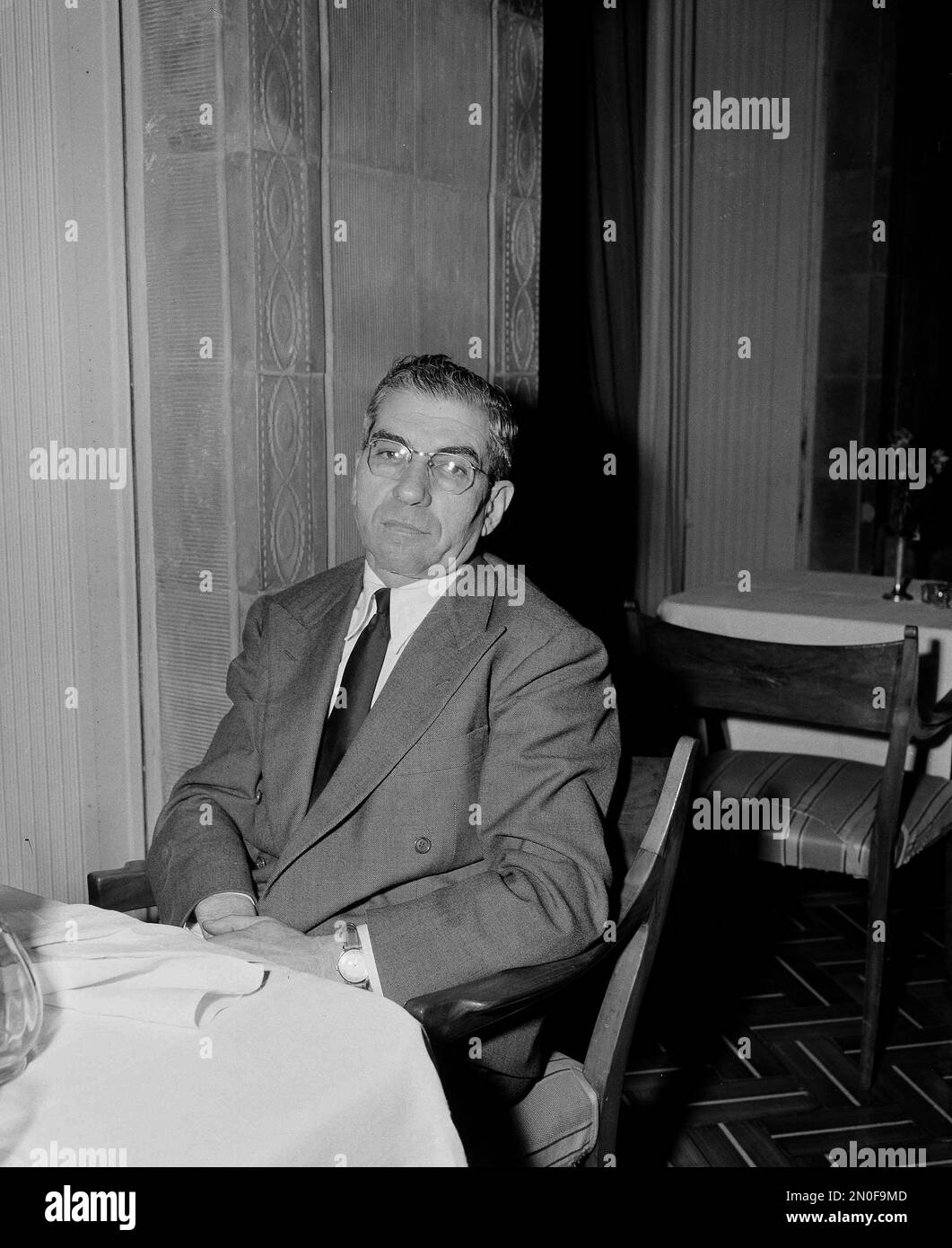 Charles "Lucky" Luciano, reputed mobster from New York City, sits in ...