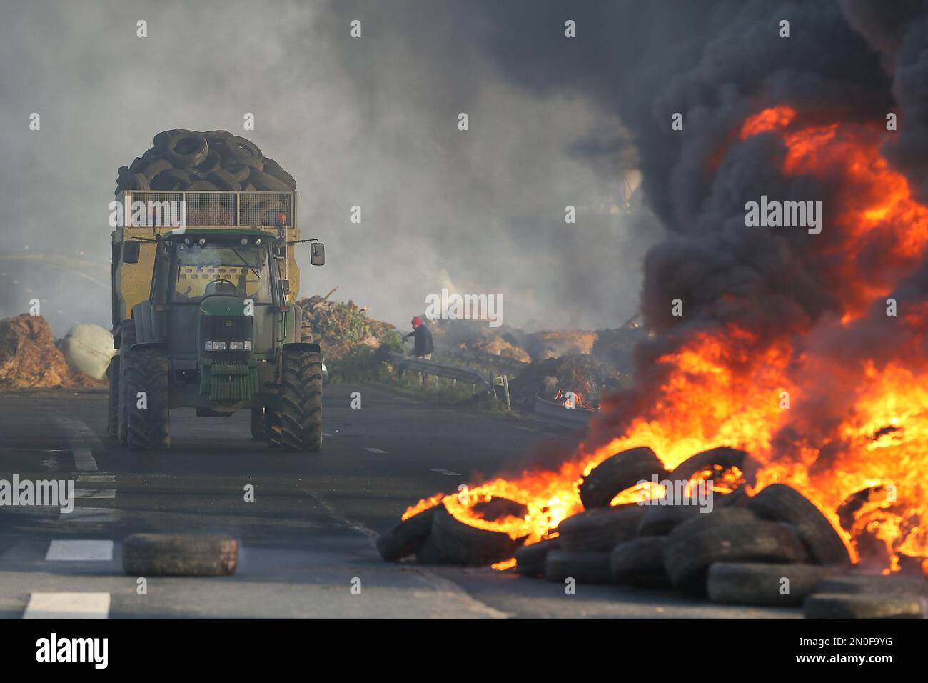 French Farmers block the RN12 road near Guingamp, western France ...