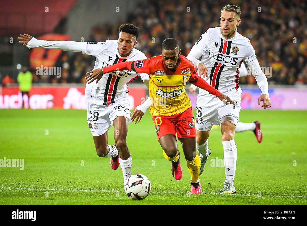 Hicham BOUDAOUI of Nice, David PEREIRA DA COSTA of Lens and Aaron ...