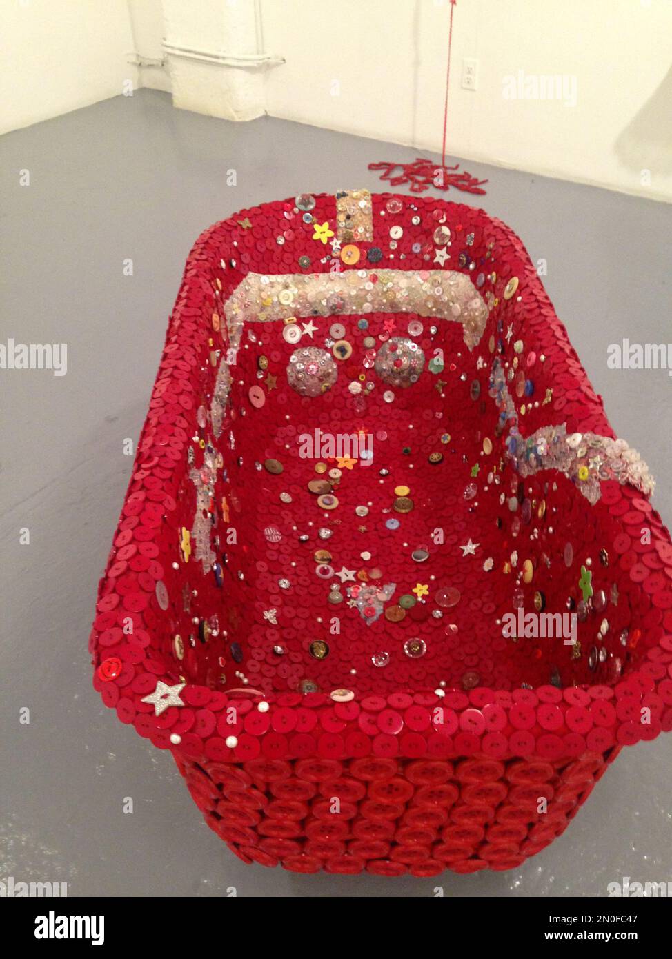 The inside of a button covered bathtub, at the Button Show at the Rush ...