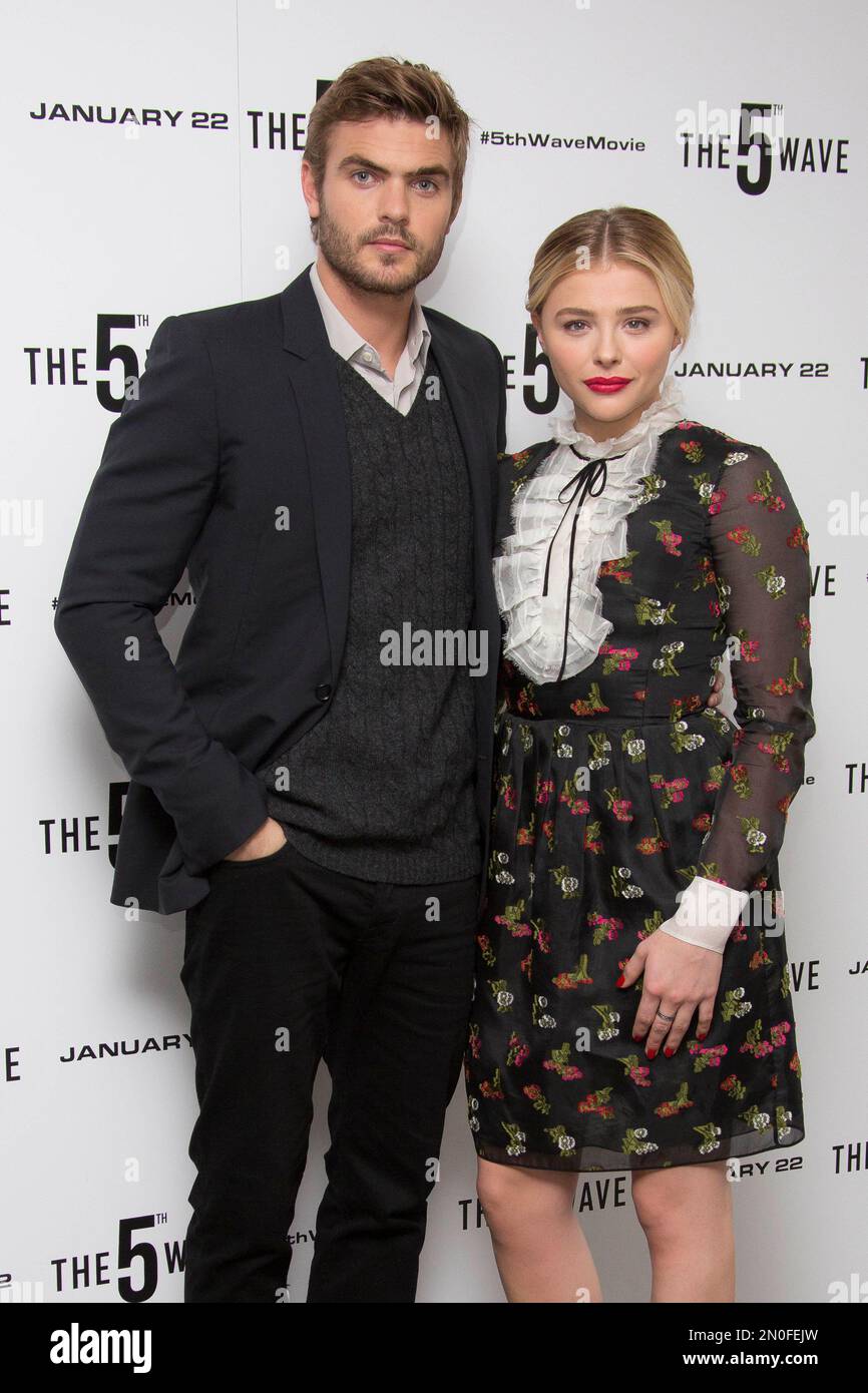 Actors Chloe Moretz, right, and Alex Roe pose for photographers during ...