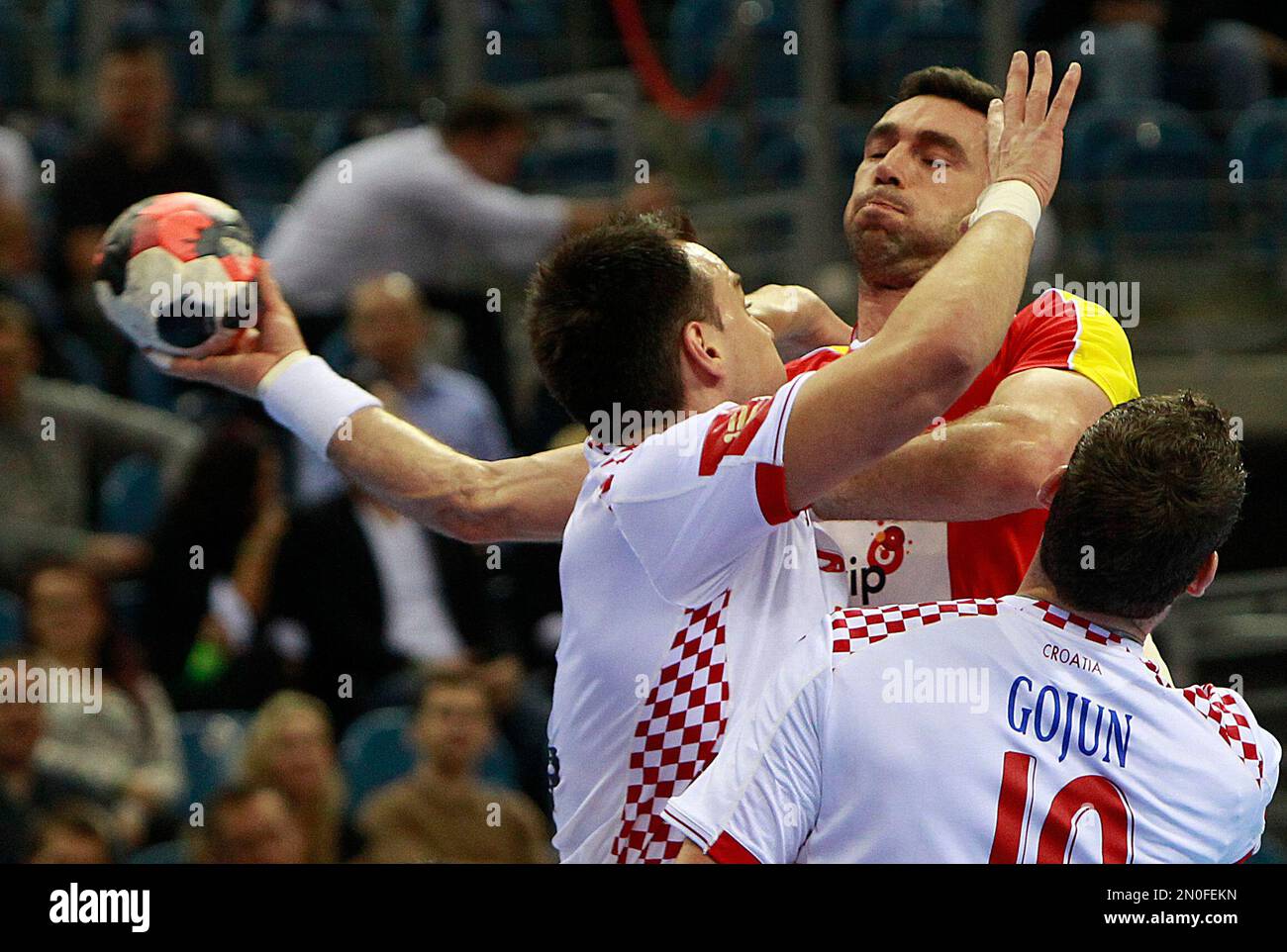 Macedonia’s Filip Mirkulovski, top, and Croatia's Marino Maric and ...