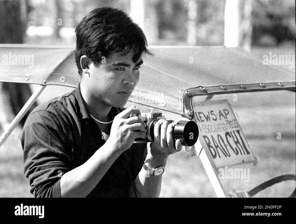 AP combat photographer Nick Ut is pictured in Saigon beside his car in ...