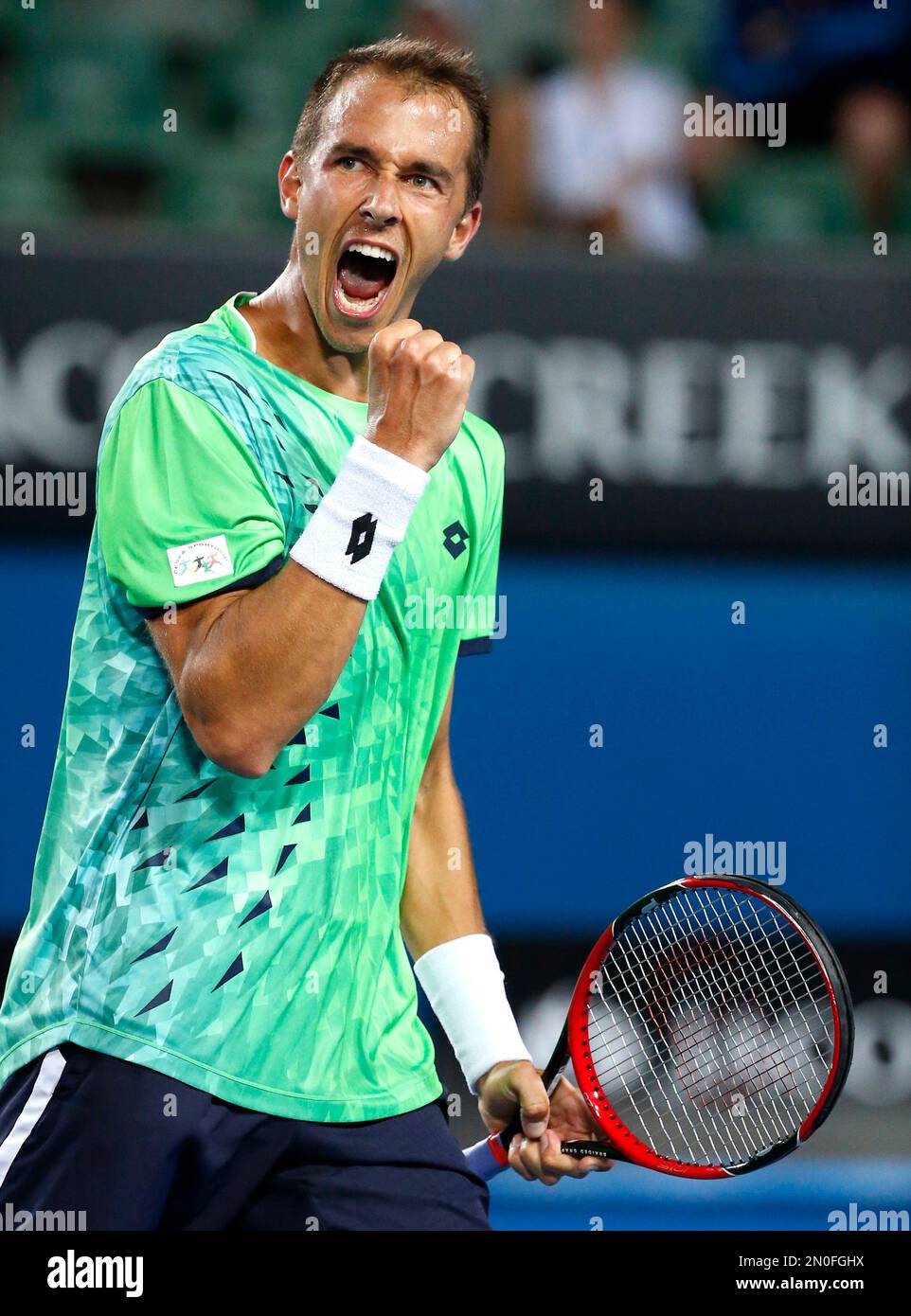 Lukas Rosol of the Czech Republic celebrates a point win over Jack Sock ...