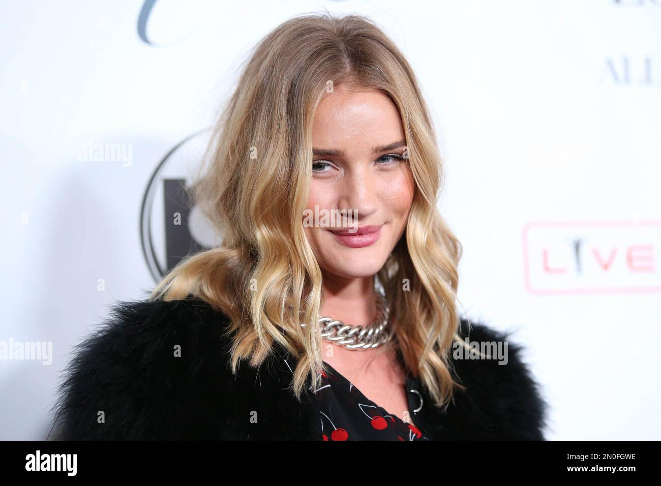Rosie Huntington-Whiteley arrives at the grand opening of "Jennifer ...