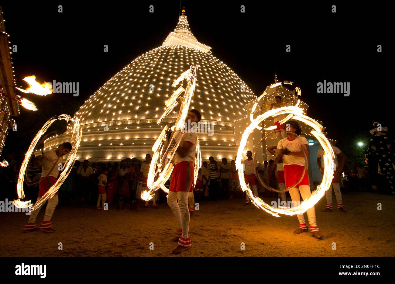 In this photo taken on Jan. 20, 2016, Sri Lankan fireball dancers ...