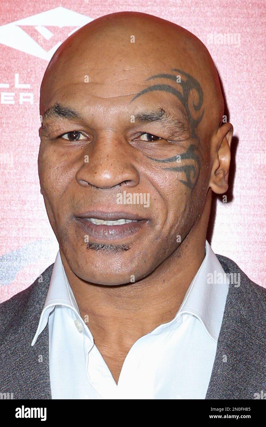 Mike Tyson arrives at the Premiere of "Ip Man 3" at Pacific Theatres at ...