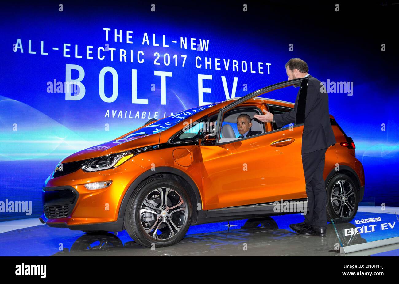 President Barack Obama sits in a new Chevrolet Bolt electric car as ...