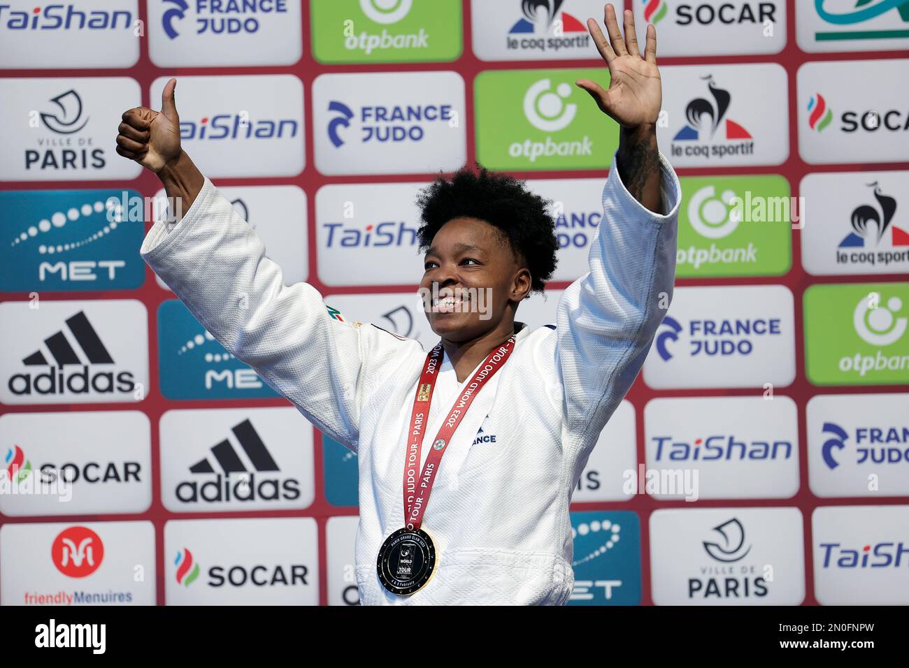 France's Audrey Tcheumeo poses with her gold medal after winning ...