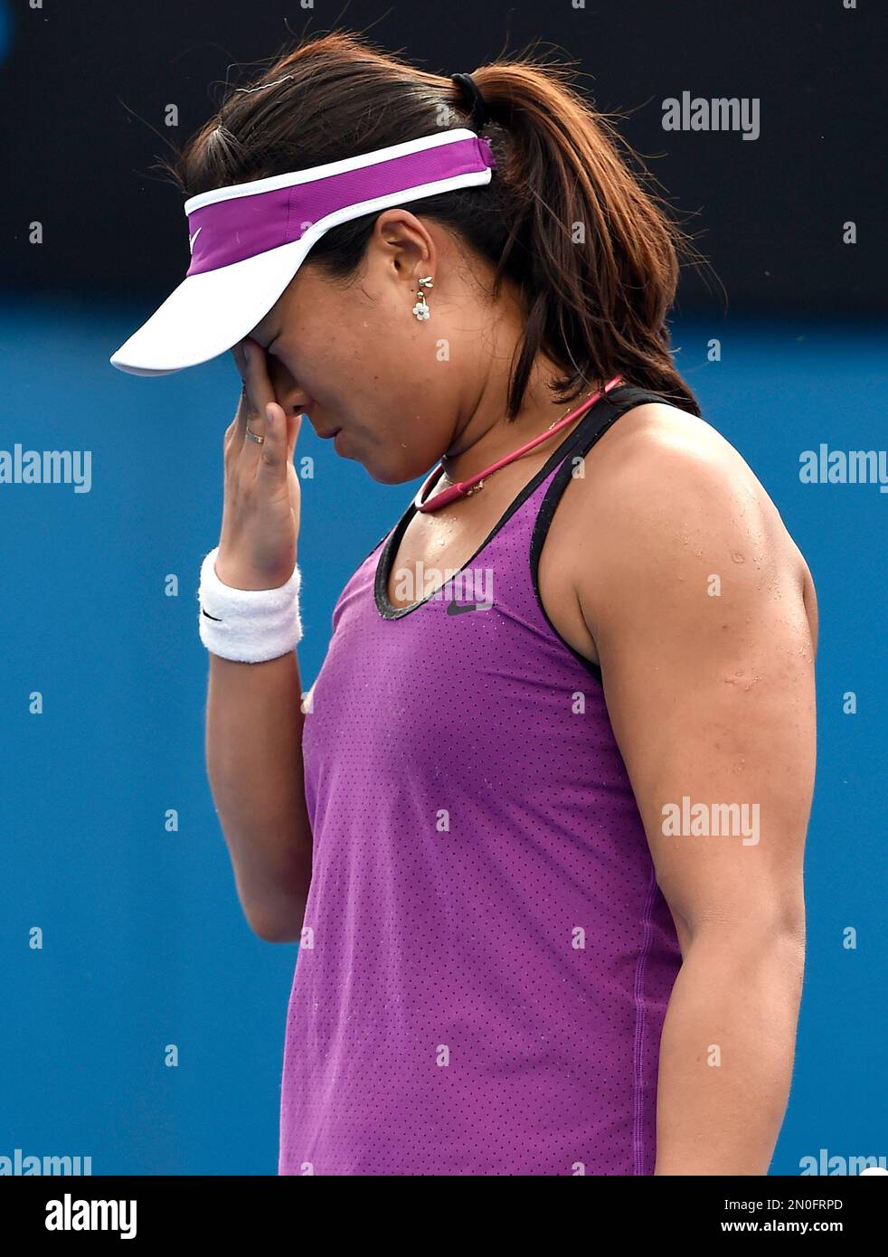 Han Xinyun of China reacts after losing a point to Yulia Putintseva of ...
