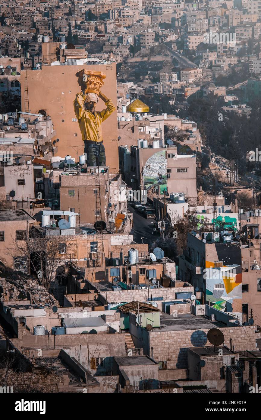 The terraced buildings of downtown Amman at sunset, capturing the ...