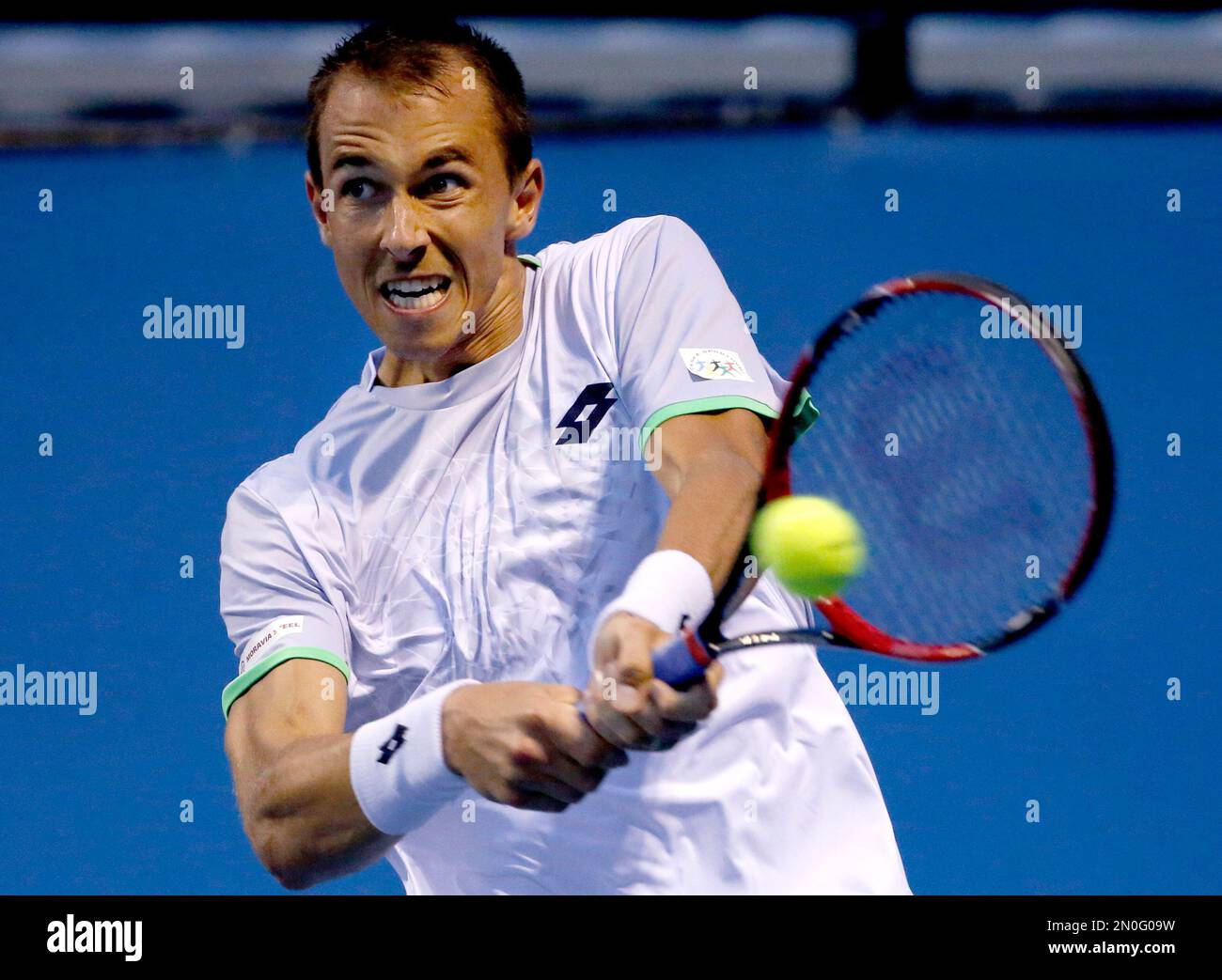 Lukas Rosol of the Czech Republic makes a backhand return to Taro ...