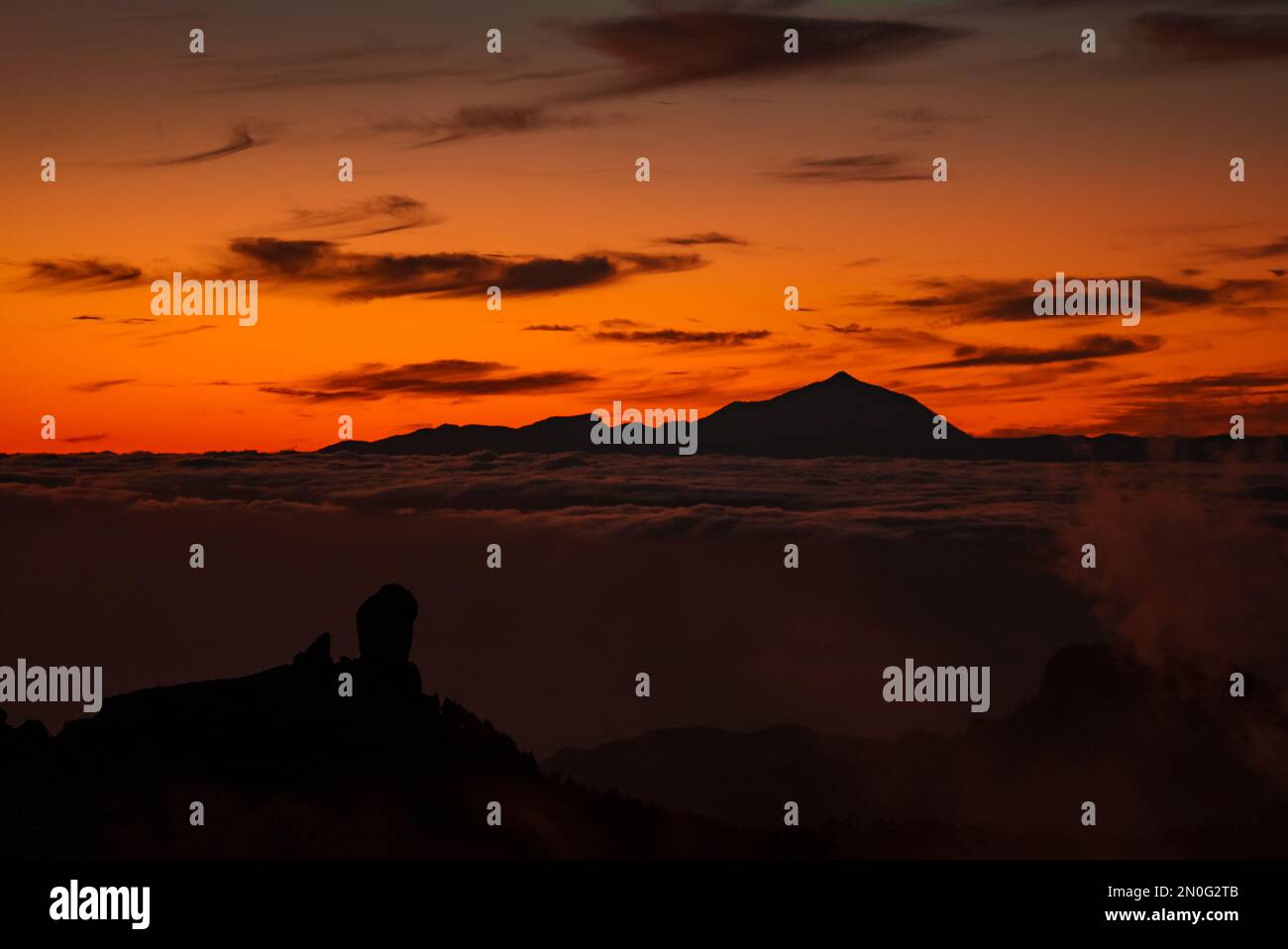 Spectacular sunset above the clouds of the Teide volcano national park ...