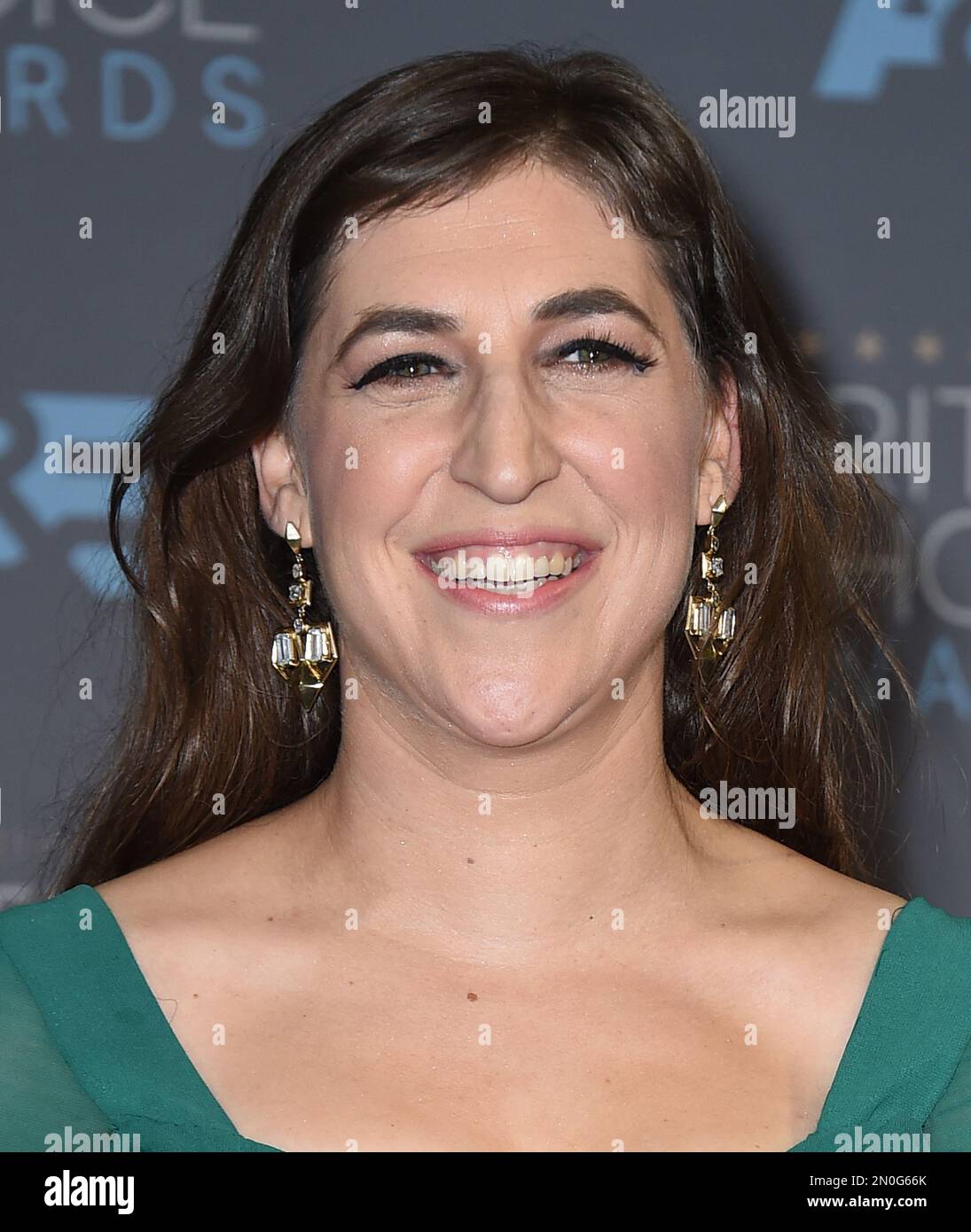 Mayim Bialik poses in the press room with the award for best supporting actress in a comedy ...