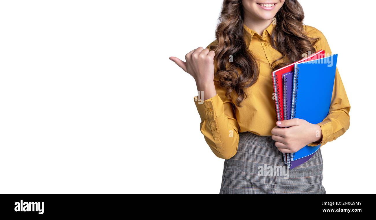 photo of school student girl with homework, point finger. school ...