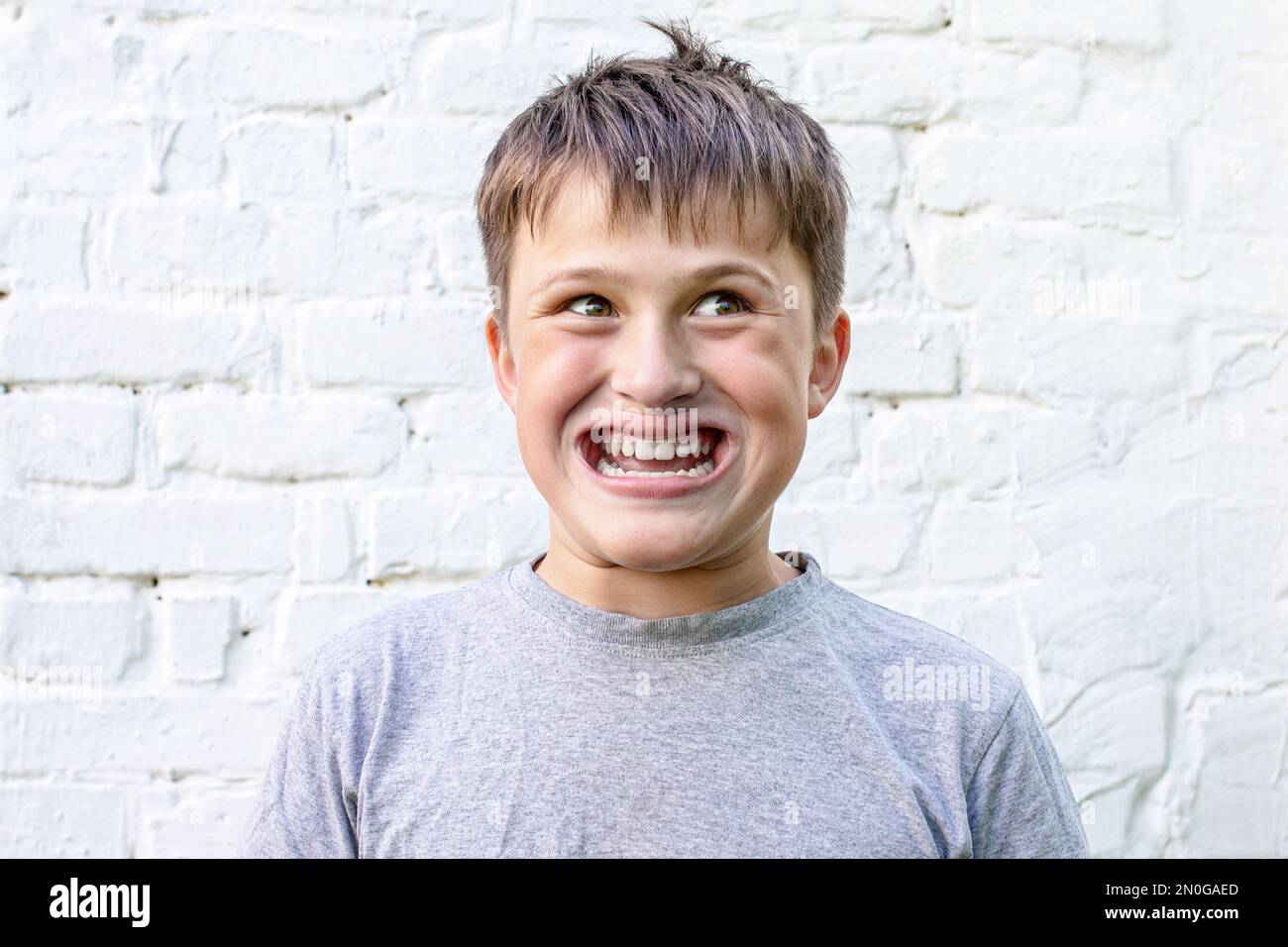 grinned at child. boy smiling at 32 teeth. rocky over-the-erring child ...