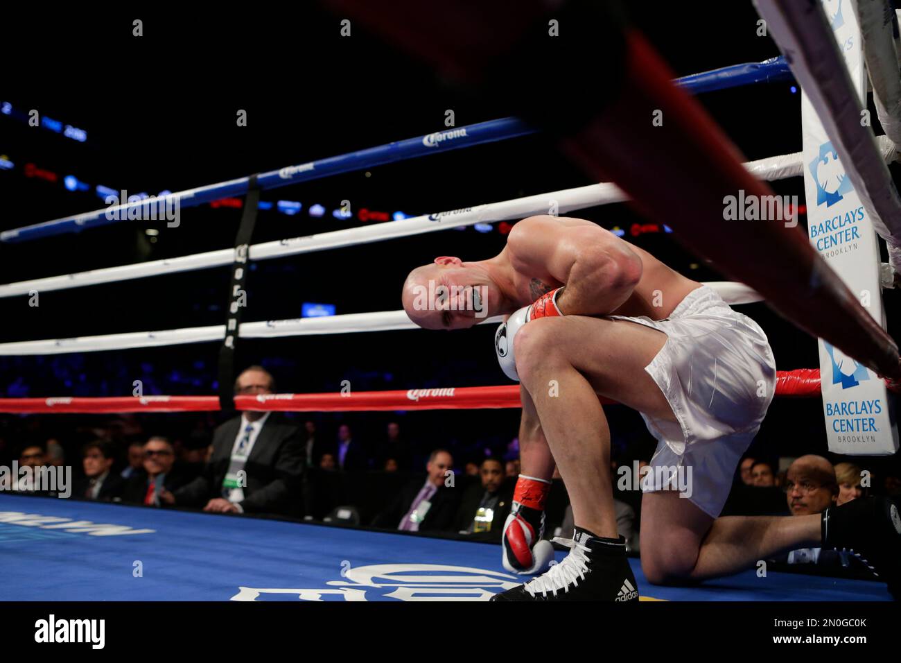Joseph Gardner reacts after being knocked down by Mike Lee during the ...