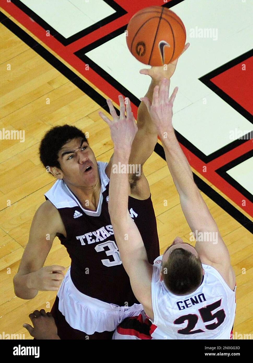 Texas A&M center Tyler Davis (34) blocks a shot attempt from Georgia ...