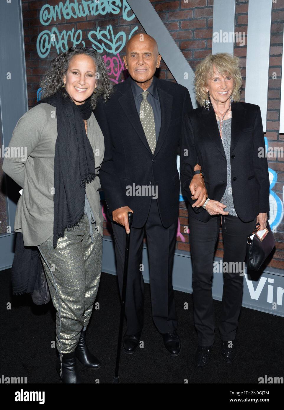 Actor Harry Belafonte poses with his wife Pamela Frank, right, and ...