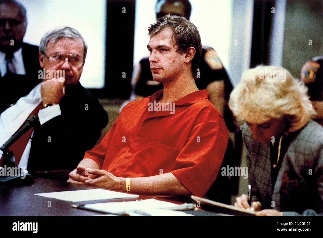 Accused serial killer Jeffrey L. Dahmer, center, sits with attorneys ...