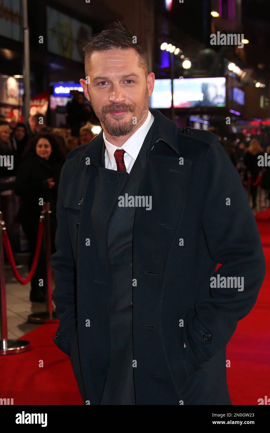 Actor Tom Hardy poses for photographers upon arrival at the premiere of ...