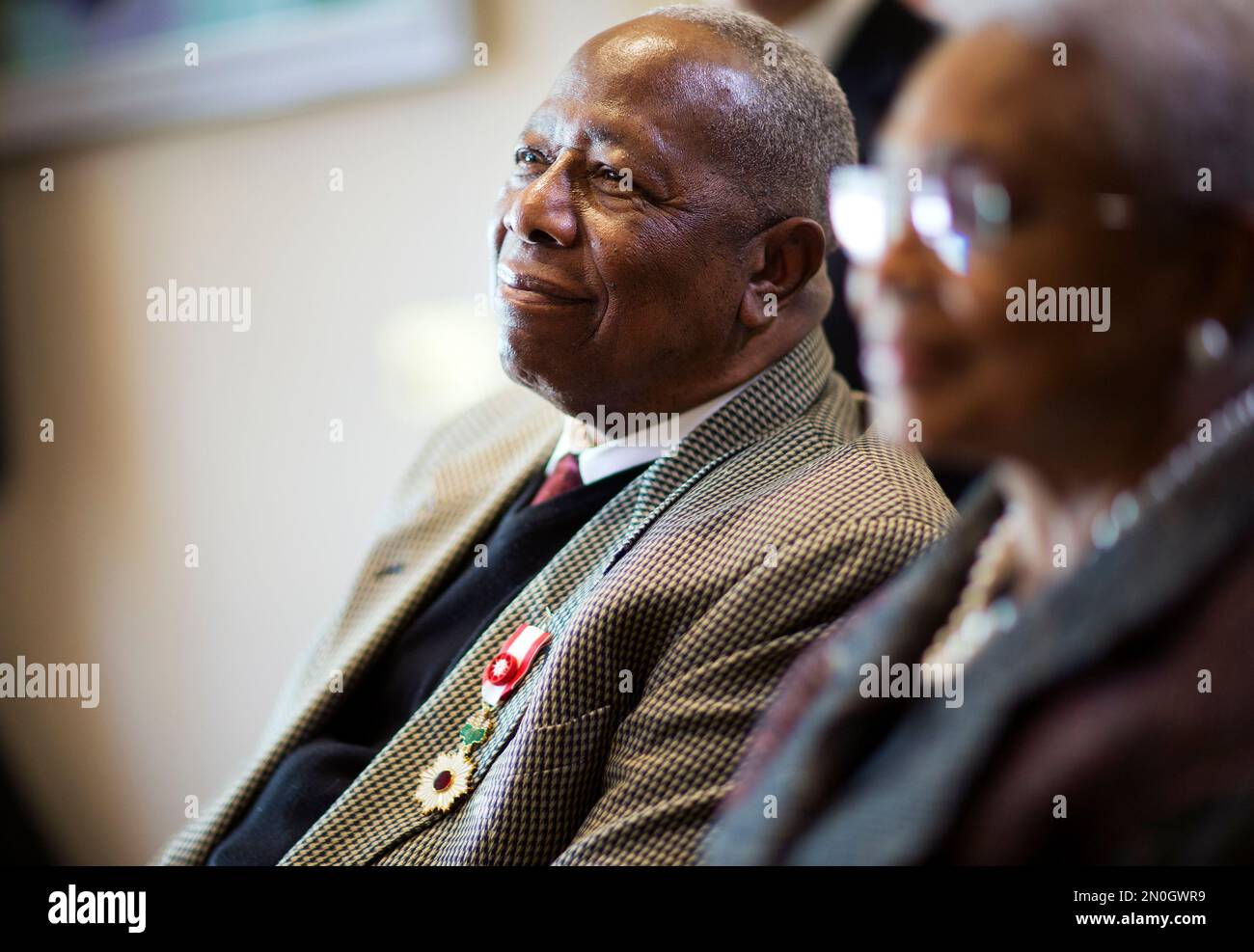 Hank Aaron, left, looks on with wife Billye during a ceremony ...