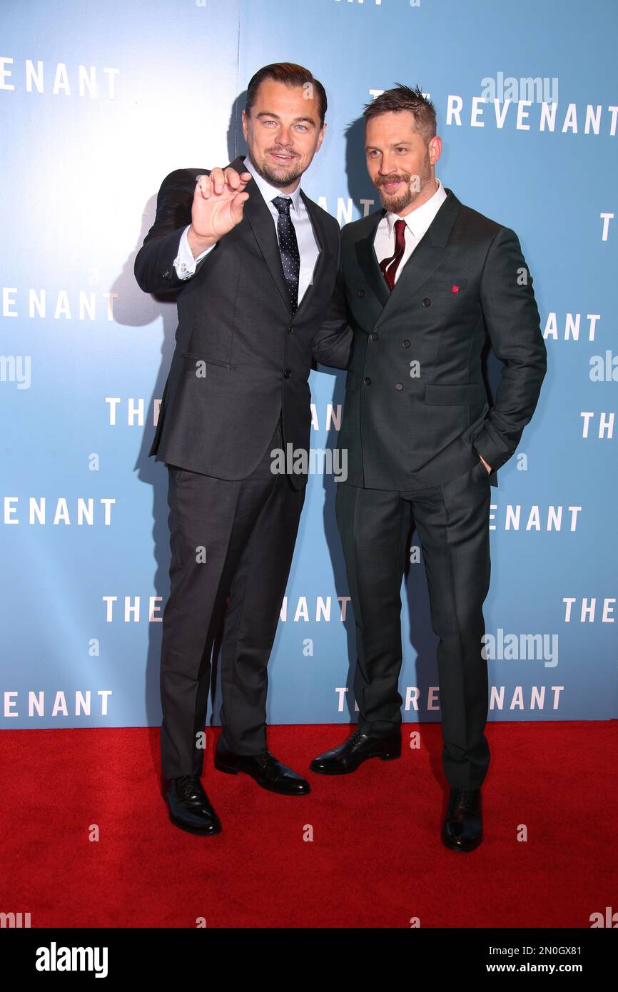 Actors Leonardo DiCaprio, left, and Tom Hardy pose for photographers ...