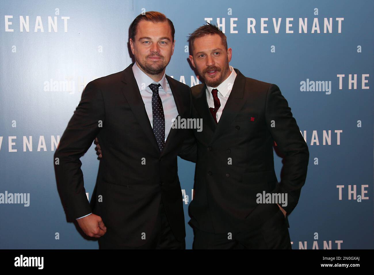Actors Leonardo DiCaprio, left, and Tom Hardy pose for photographers ...