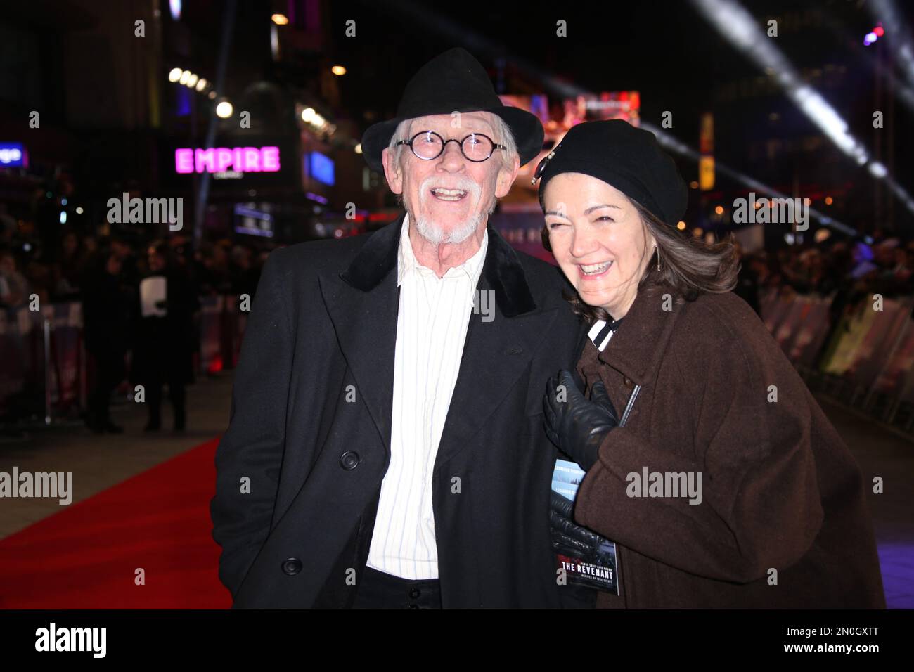 Actor John Hurt, left, and Anwen Rees-Myers pose for photographers upon ...