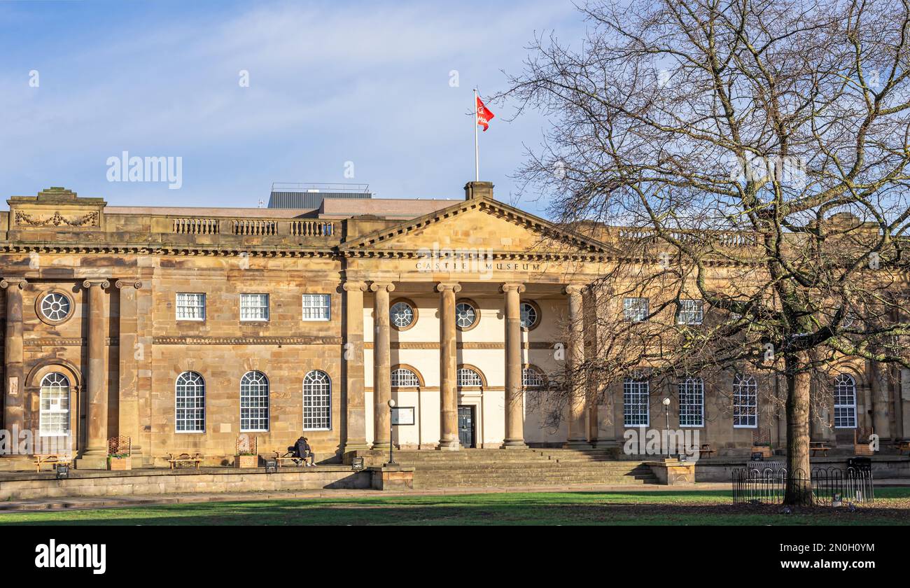An 18th Century building made of stone with carvings and tall columns ...
