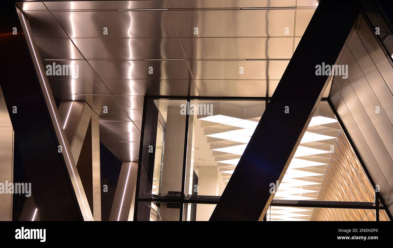 Combination of metal and glass wall material. Steel facade on columns ...