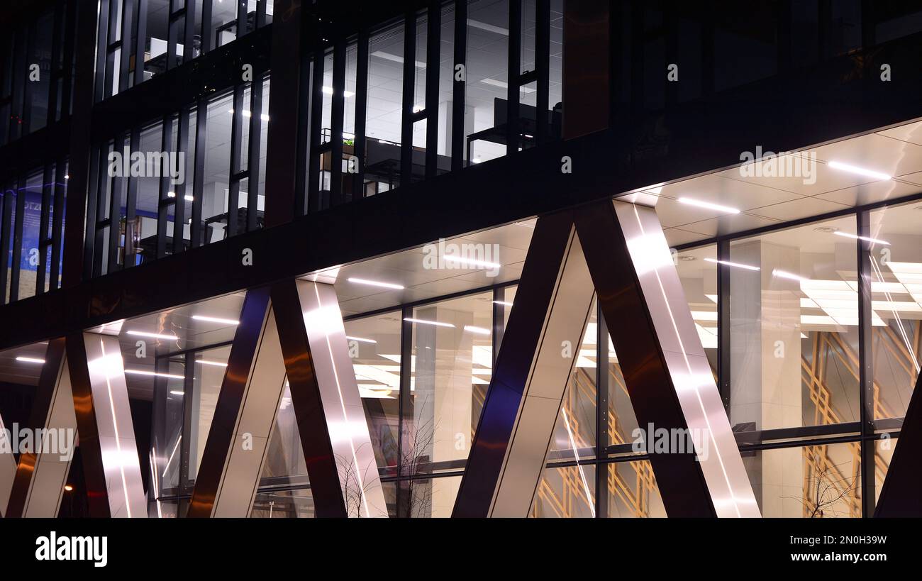 Combination of metal and glass wall material. Steel facade on columns ...