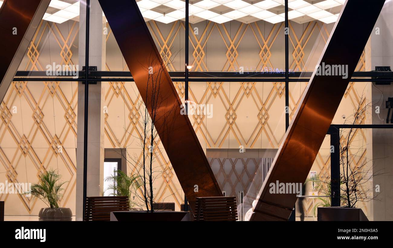 Combination of metal and glass wall material. Steel facade on columns ...