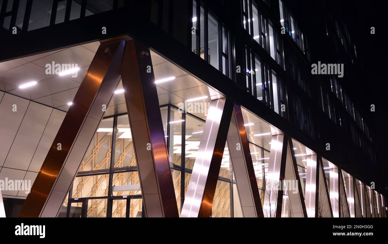 Combination of metal and glass wall material. Steel facade on columns ...