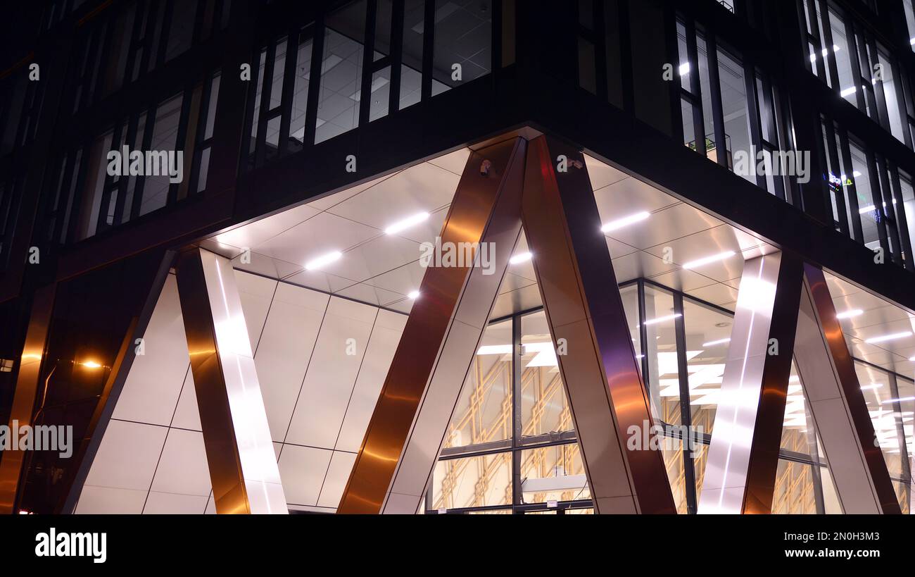 Combination of metal and glass wall material. Steel facade on columns ...