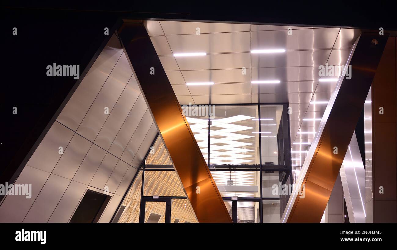 Combination of metal and glass wall material. Steel facade on columns ...