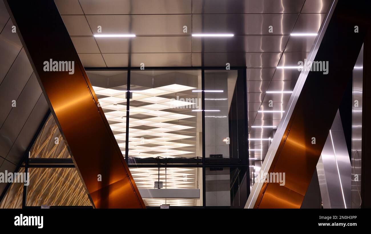 Combination of metal and glass wall material. Steel facade on columns ...