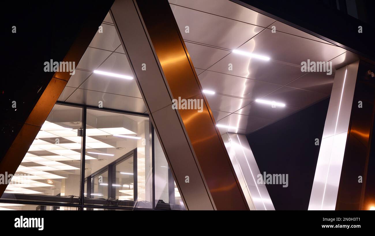 Combination of metal and glass wall material. Steel facade on columns ...