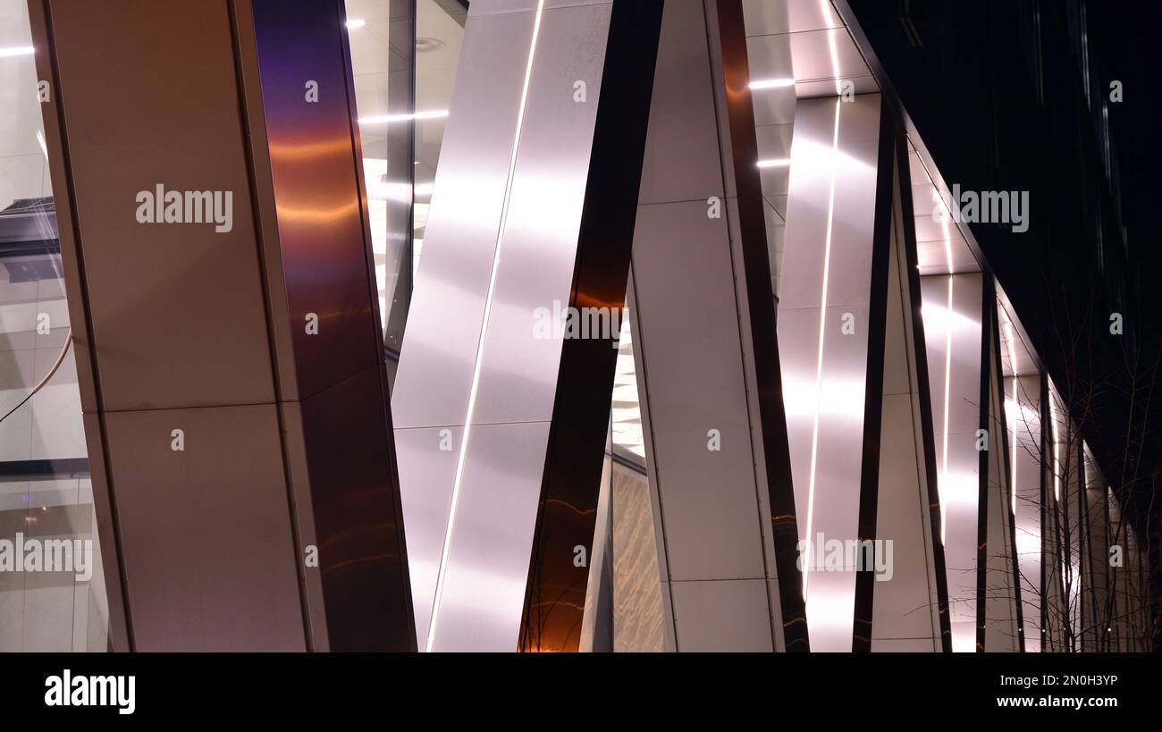 Combination of metal and glass wall material. Steel facade on columns ...