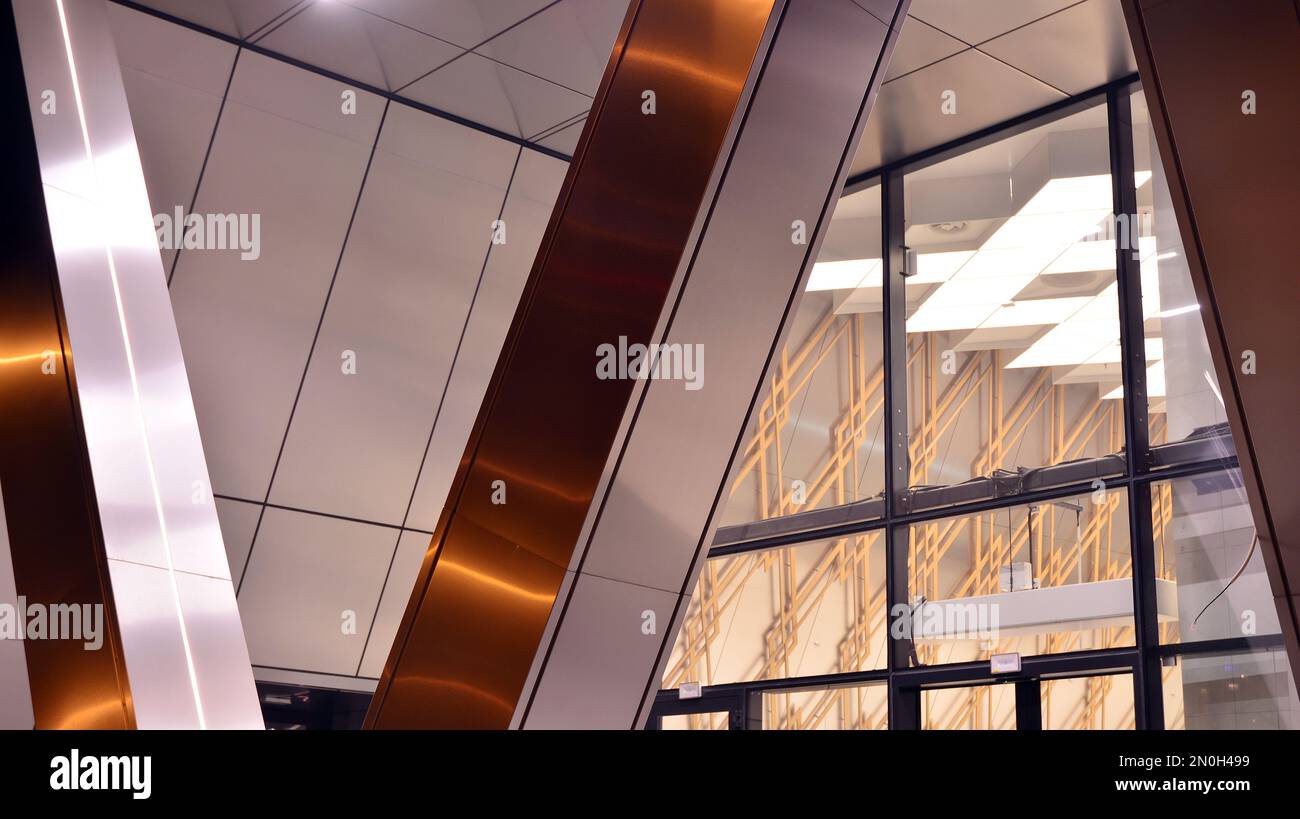 Combination of metal and glass wall material. Steel facade on columns ...