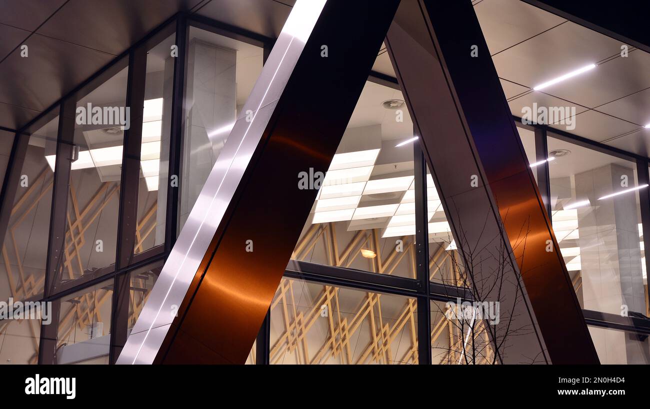 Combination of metal and glass wall material. Steel facade on columns ...