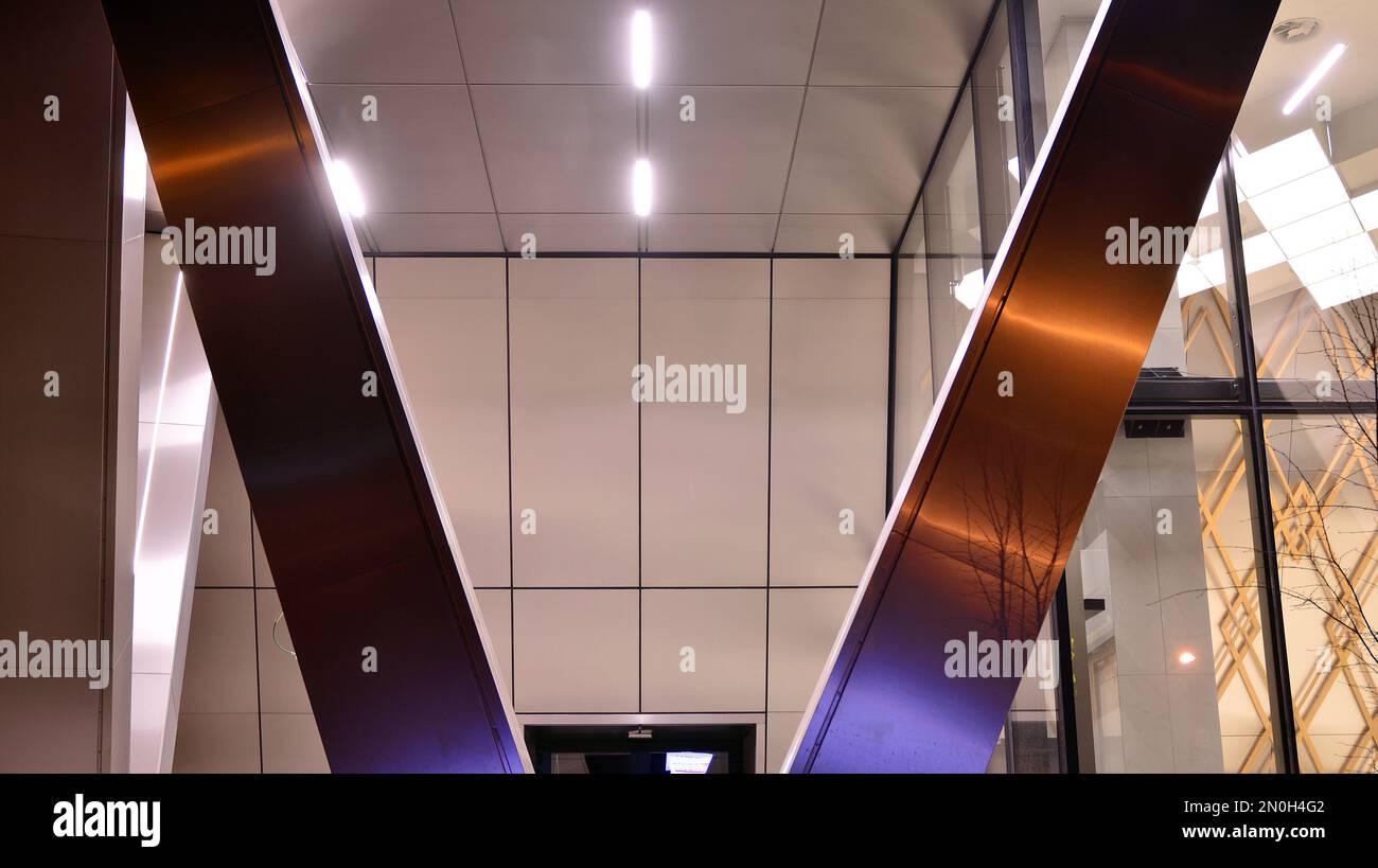 Combination of metal and glass wall material. Steel facade on columns ...