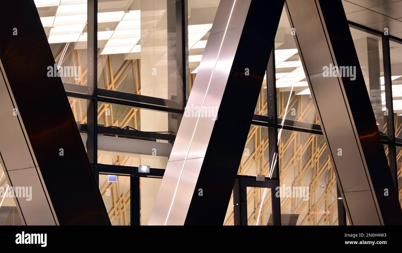 Combination of metal and glass wall material. Steel facade on columns ...