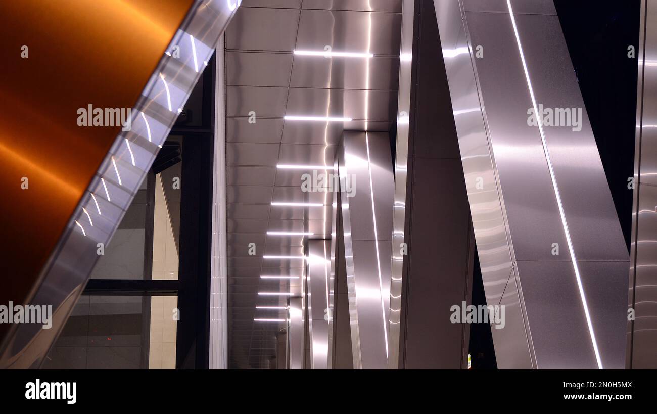 Combination of metal and glass wall material. Steel facade on columns ...