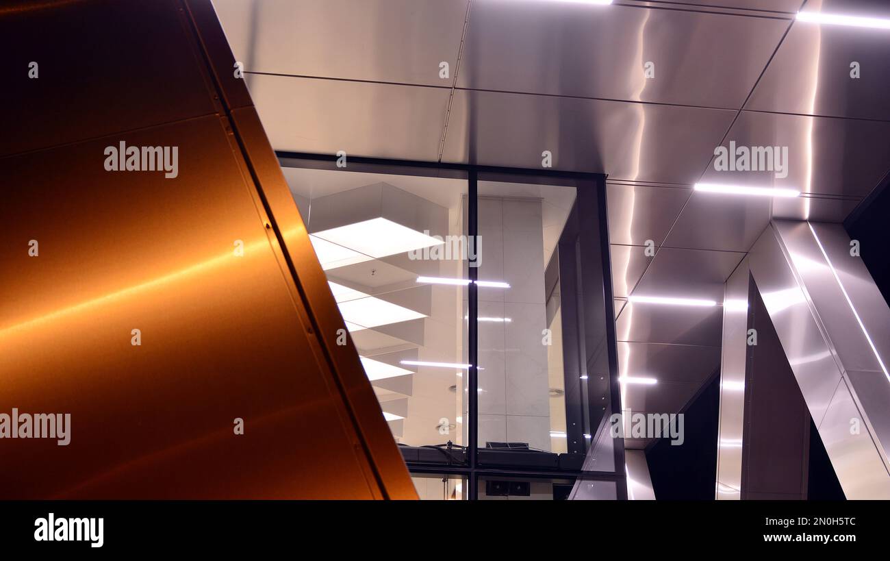 Combination of metal and glass wall material. Steel facade on columns ...