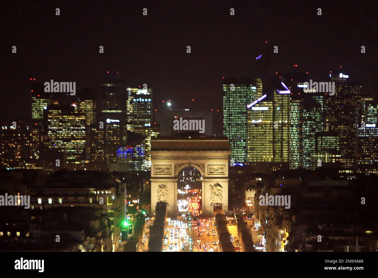 The Arc de Triomphe and the Paris' financial district of La Defense ...